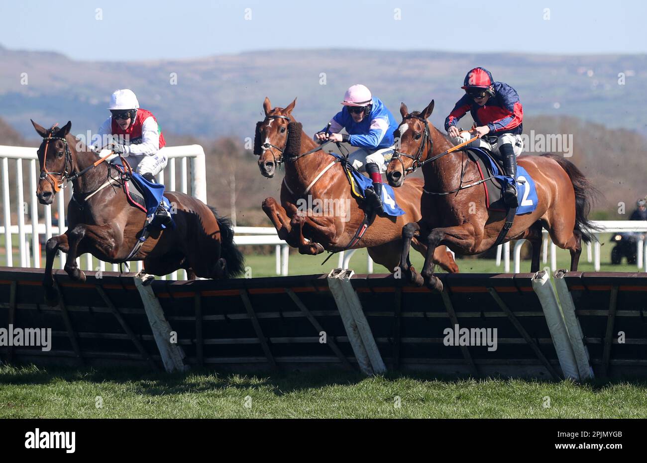 Space Voyage ridden by Lewis Stones (right) jumps the last before going ...