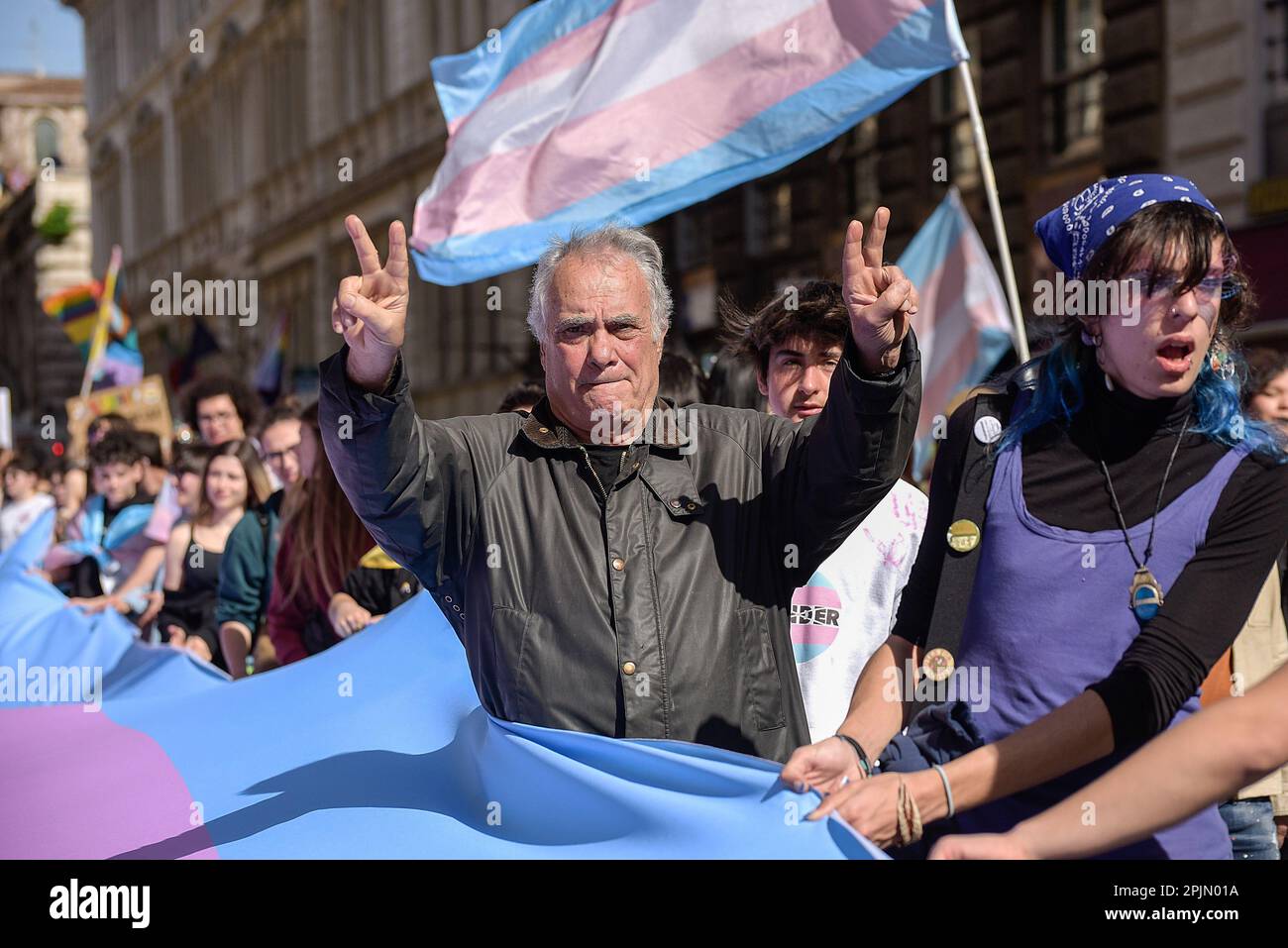 Rome, Italy. 01st Apr, 2023. Protesters carry a giant transgender flag ...