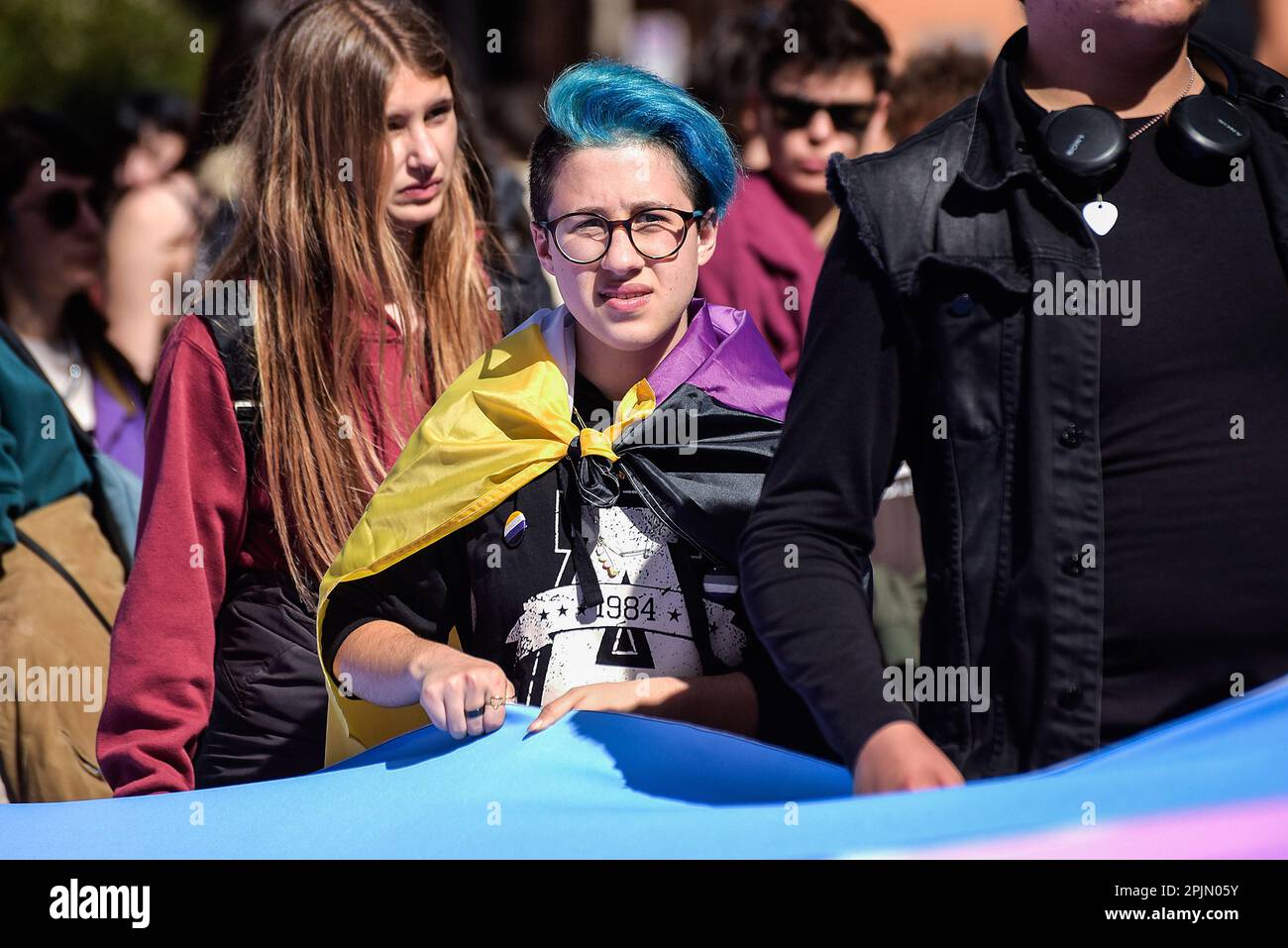 Rome, Italy. 01st Apr, 2023. Protesters carry a giant transgender flag ...
