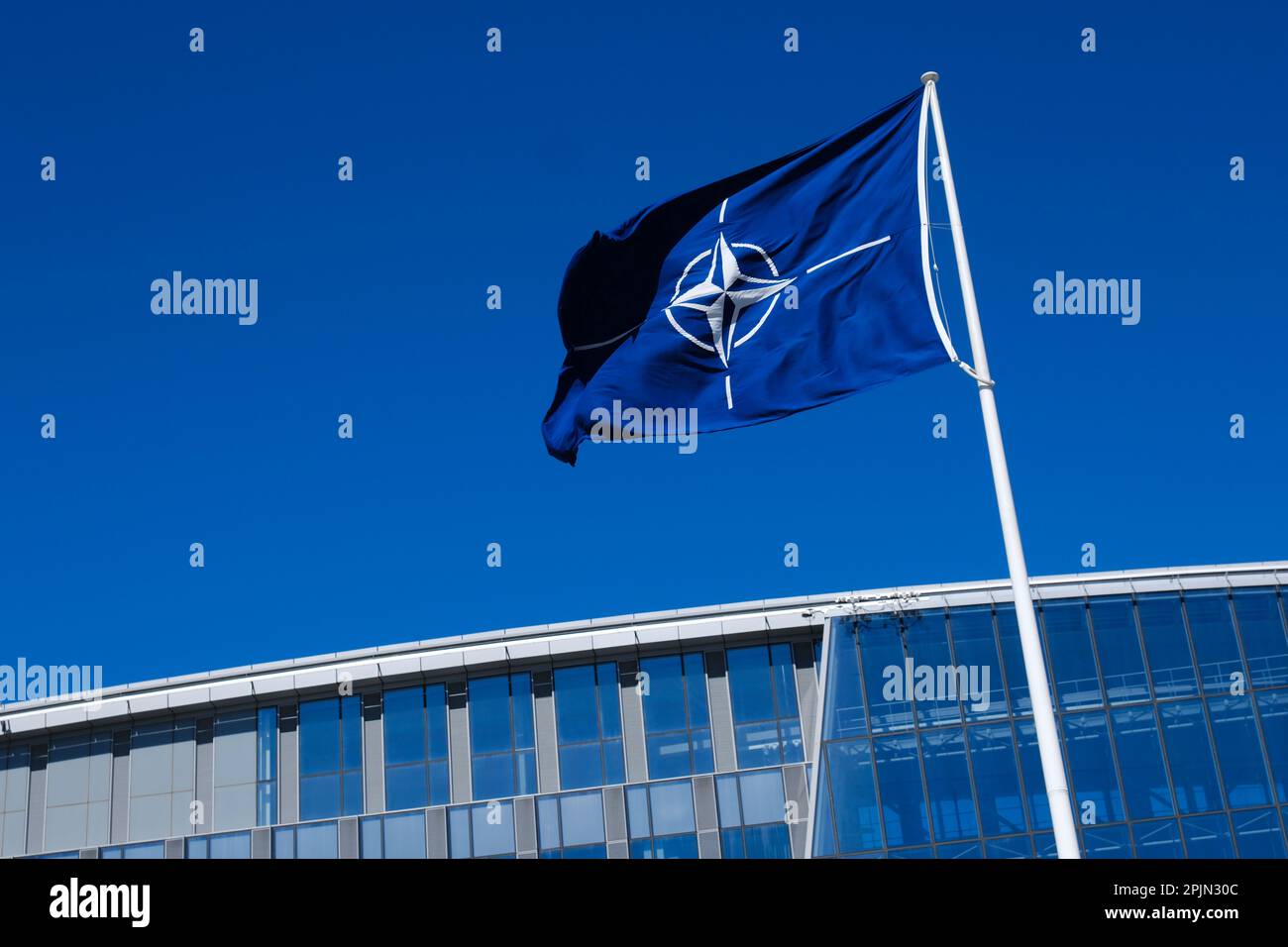 Nato headquarters flags 2023 hi-res stock photography and images - Alamy