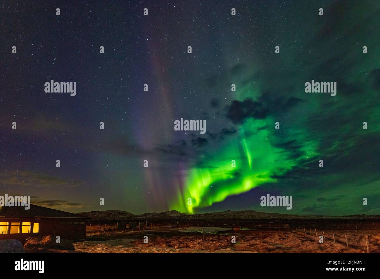 Northern Lights in the night sky in Iceland Stock Photo - Alamy
