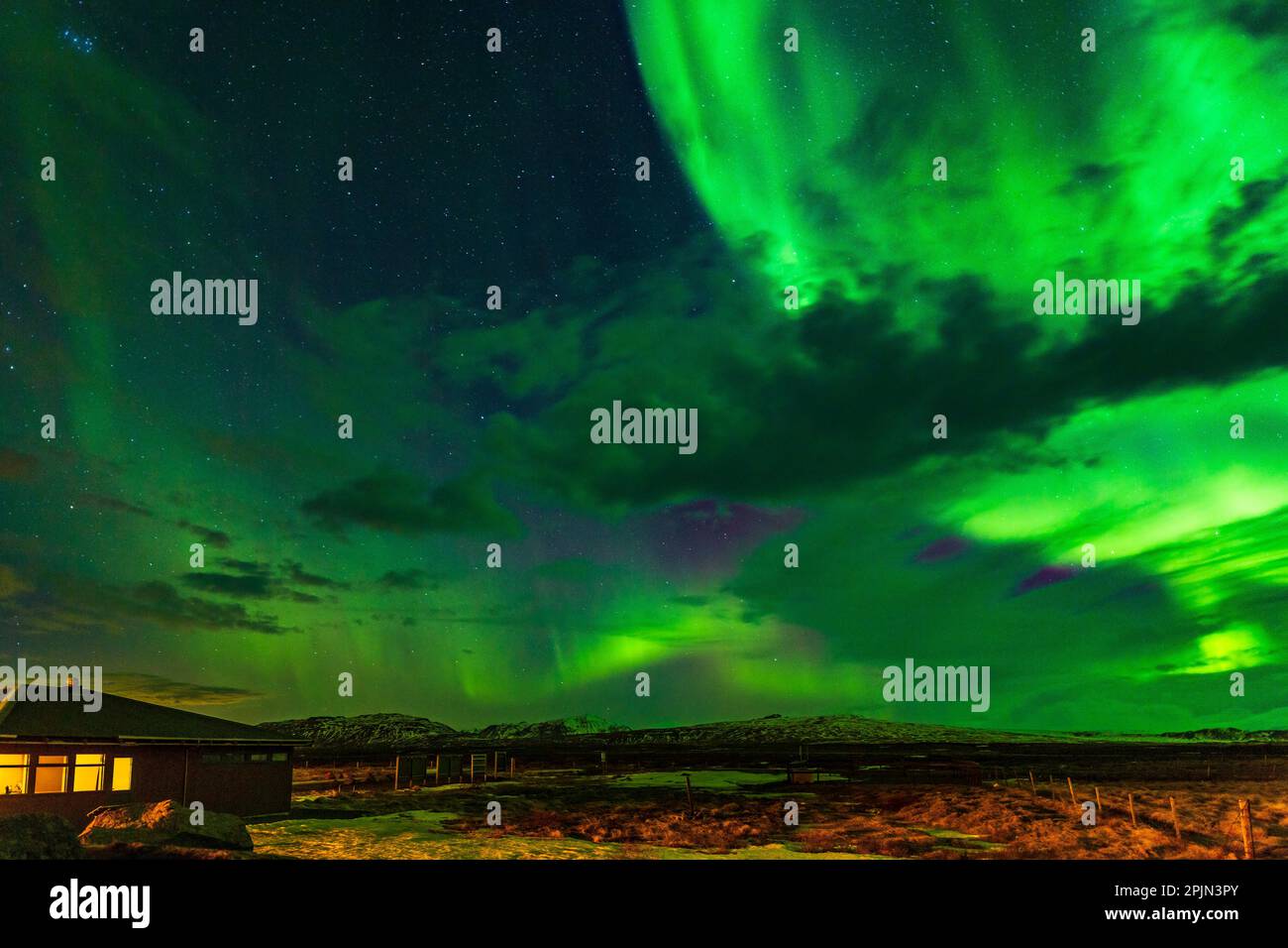 Northern Lights in the night sky in Iceland Stock Photo - Alamy