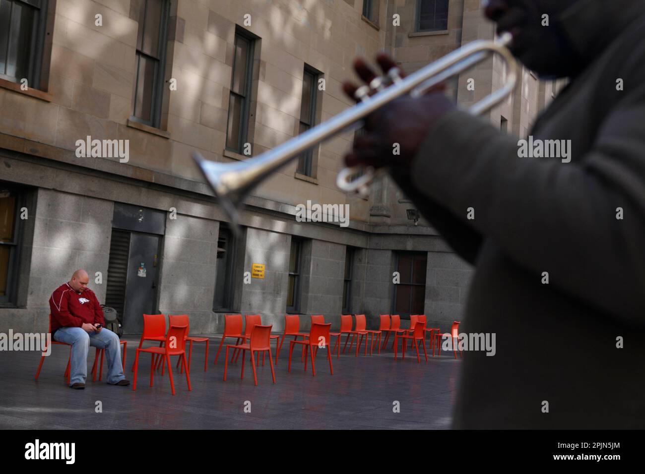 Trumpeter Reginald Conyers, a full-time street musician, plays at Mint ...