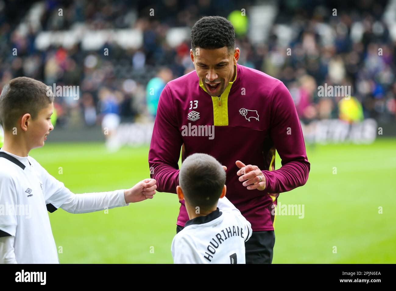Derby County's Curtis Davies poses with match day mascots during the ...