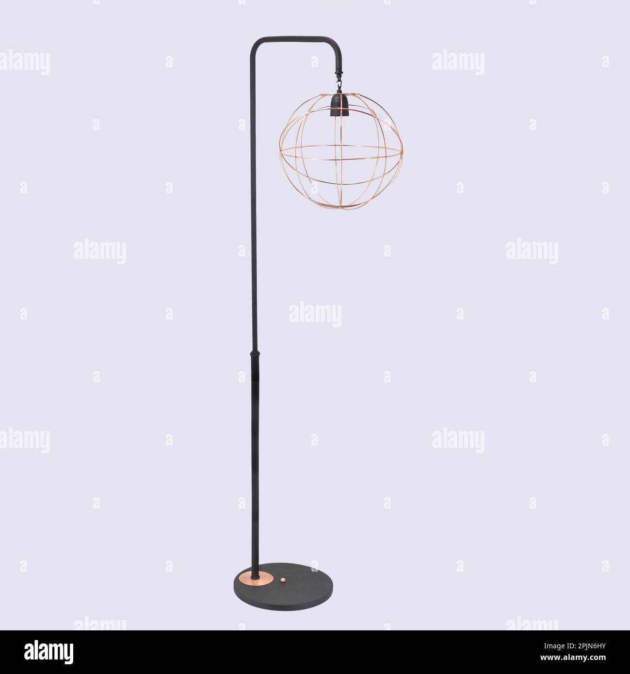 This modern industrial-style floor lamp features a black metal base and ...
