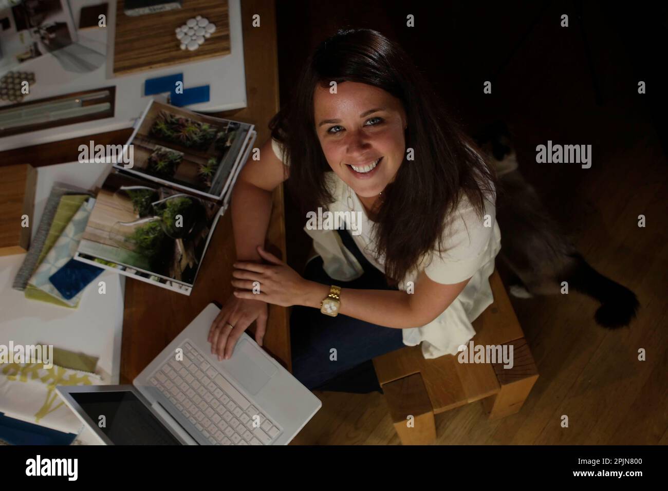 Interior designer Melissa Winn is seen in her live work space along ...