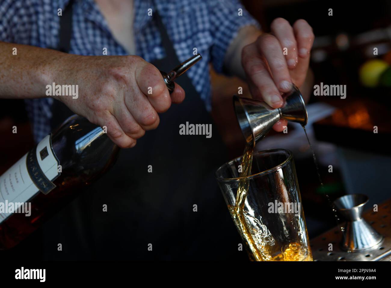 Bartender Cheri Russell prepares a cocktail at Camino on Sunday August ...