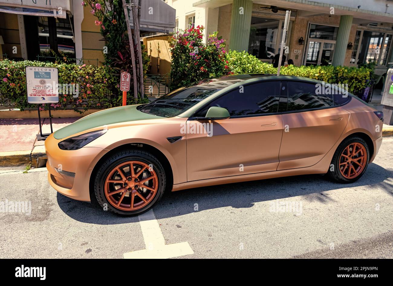Miami Beach, Florida USA - April 14, 2021: tesla model y orange matte ...