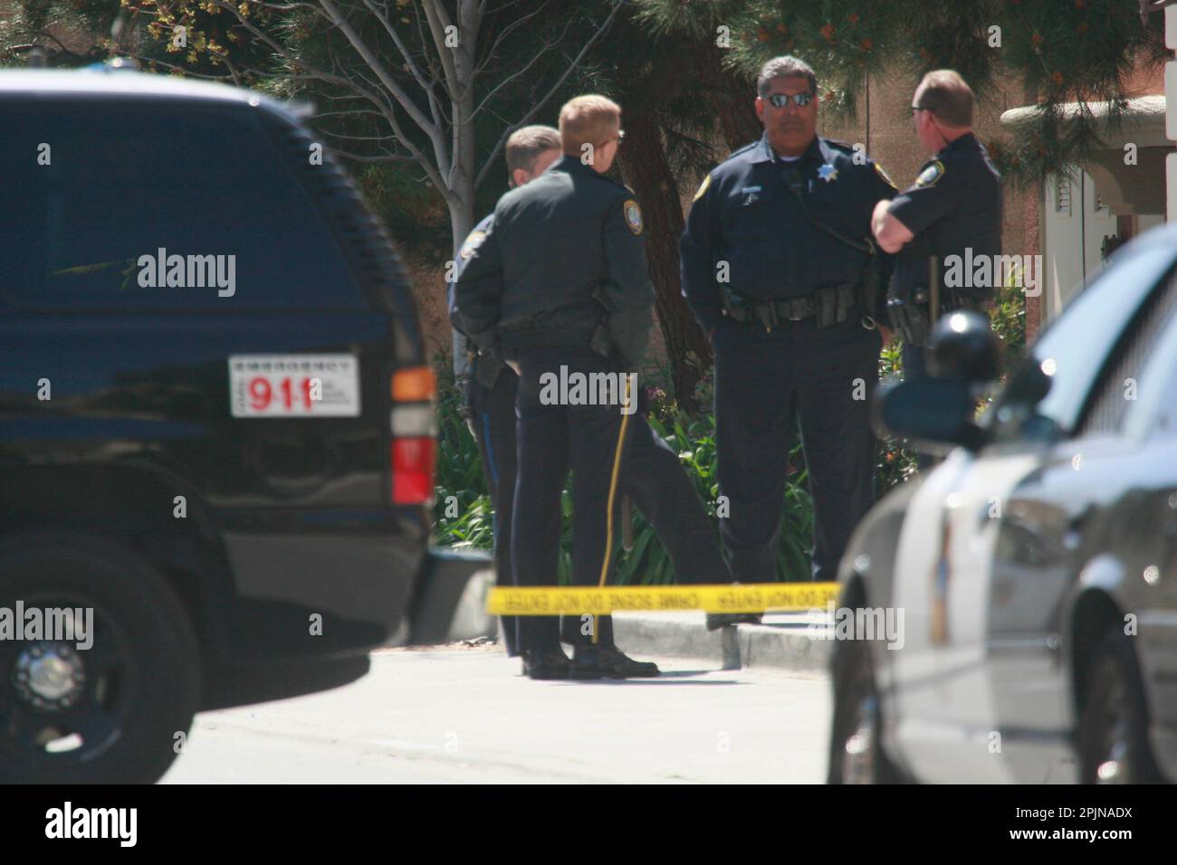 Santa Clara police officers works on Headen Way where where six people ...