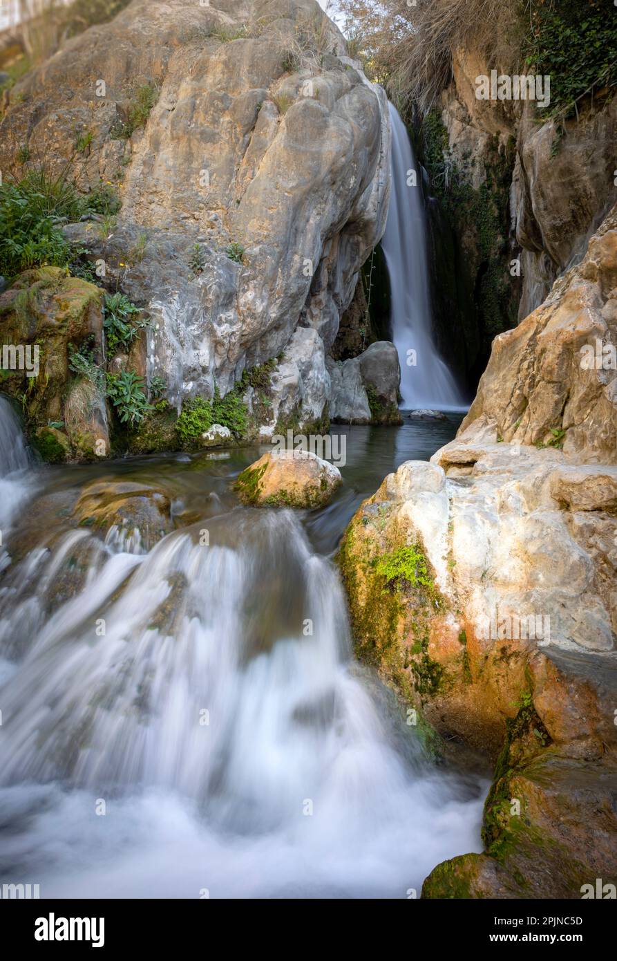 Scenic view of the main waterfall of Fuentes del Algar in Callosa d'En ...