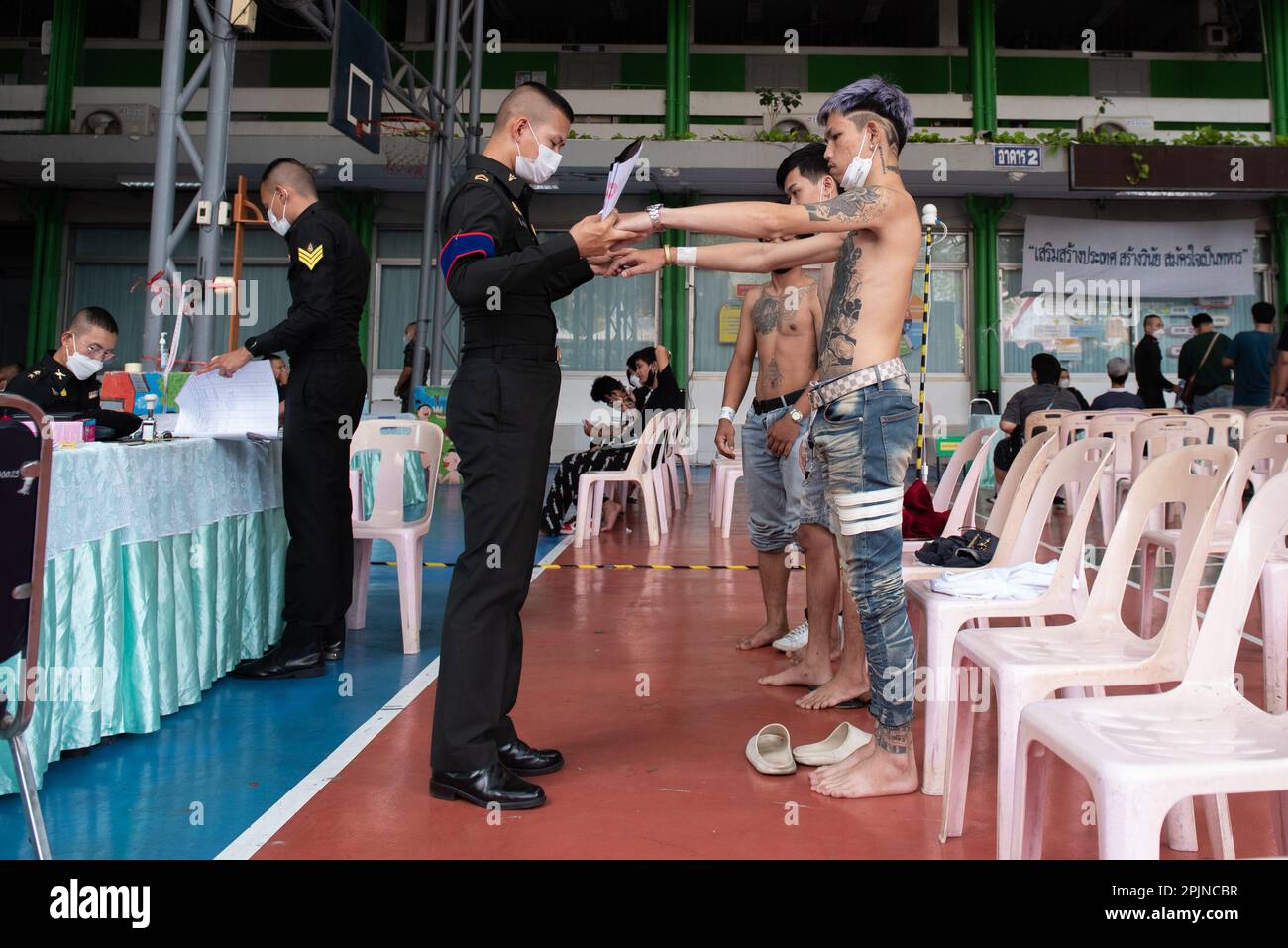 Bangkok, Thailand. 02nd Apr, 2023. A young man gets a physical ...