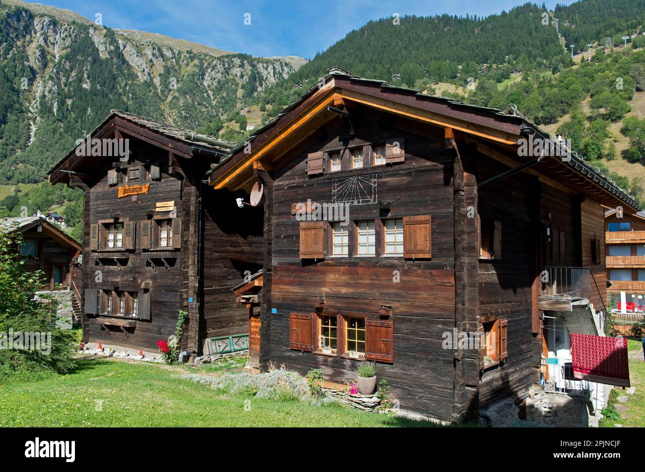 Typical Swiss chalet with sundial, Blatten near Naters, Valais ...