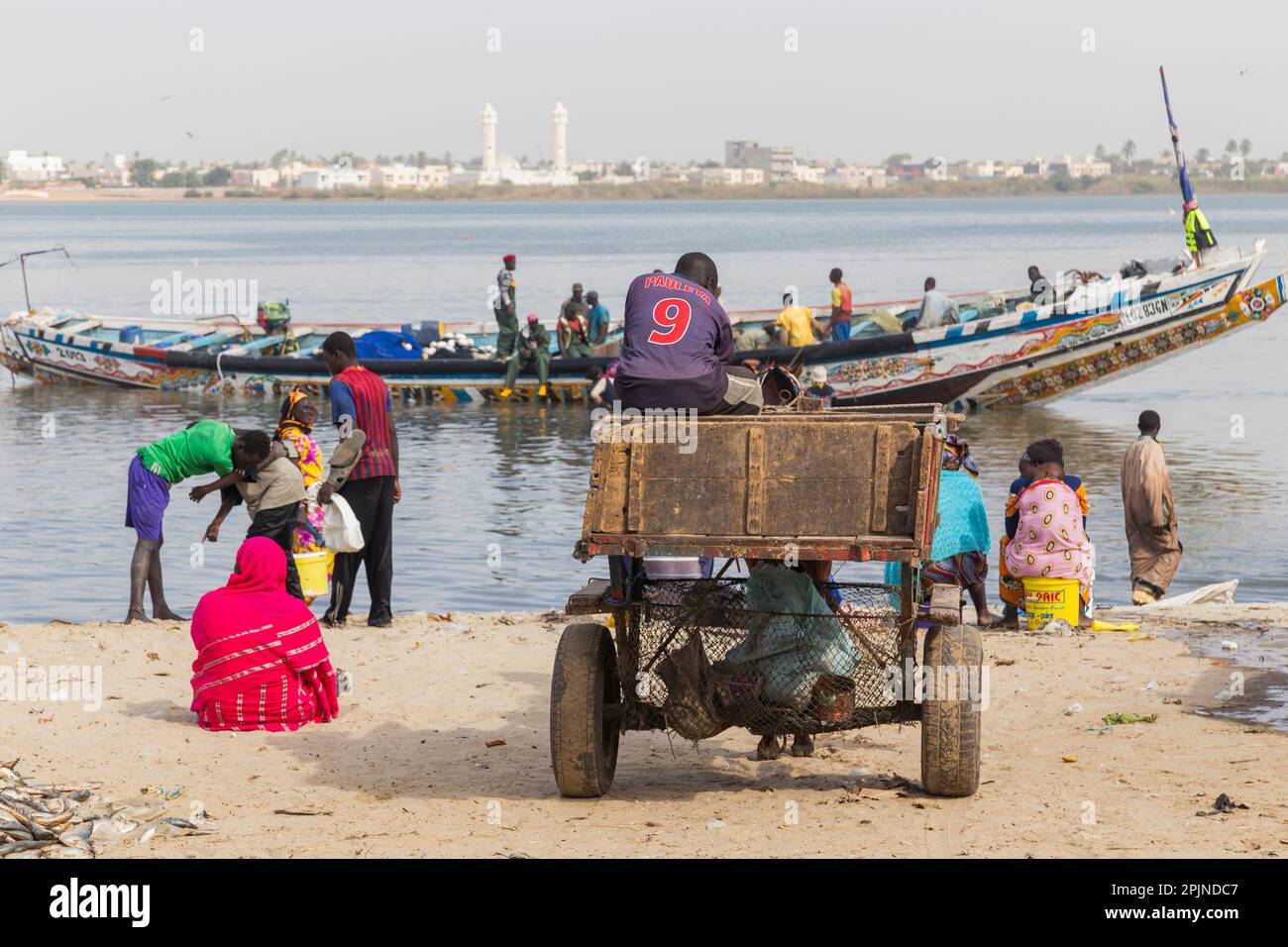 Dakar, Senegal. August 18, 2019: People buying and selling just landed ...