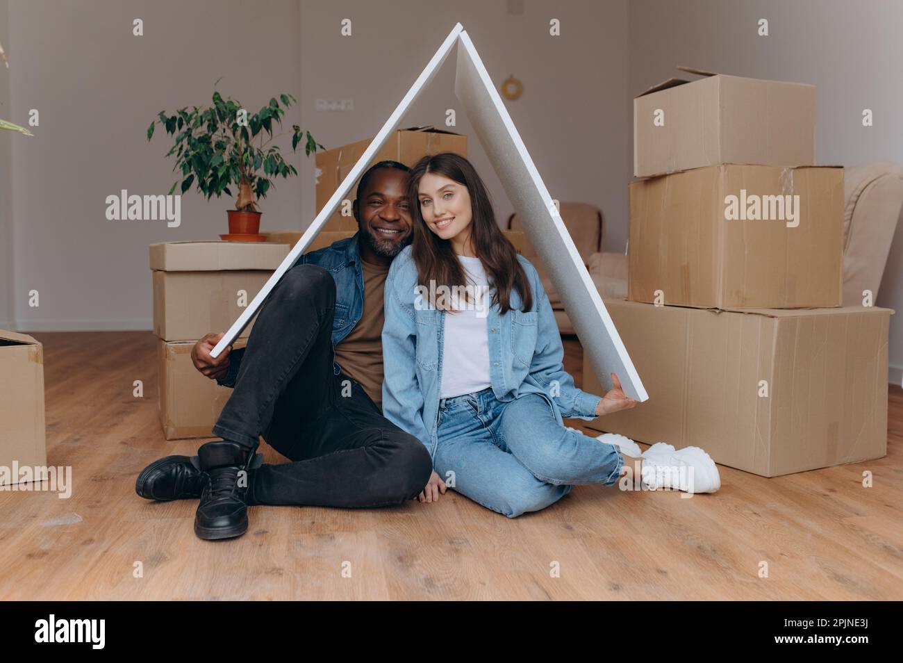 a couple moves into their own house, together they make a gesture of ...