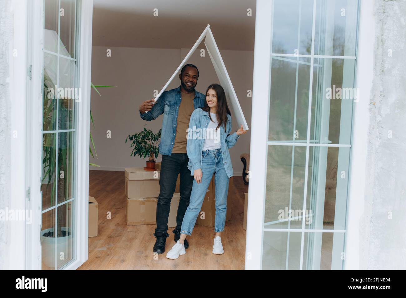 a couple moves into their own house, together they make a gesture of ...