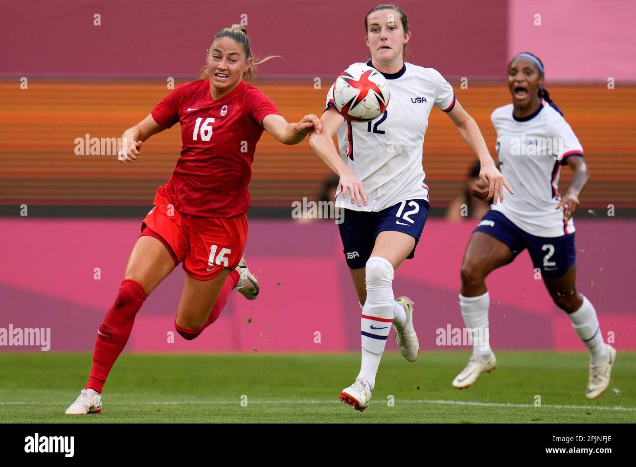 FILE - Canada's Janine Beckie, left, and United States' Tierna Davidson ...