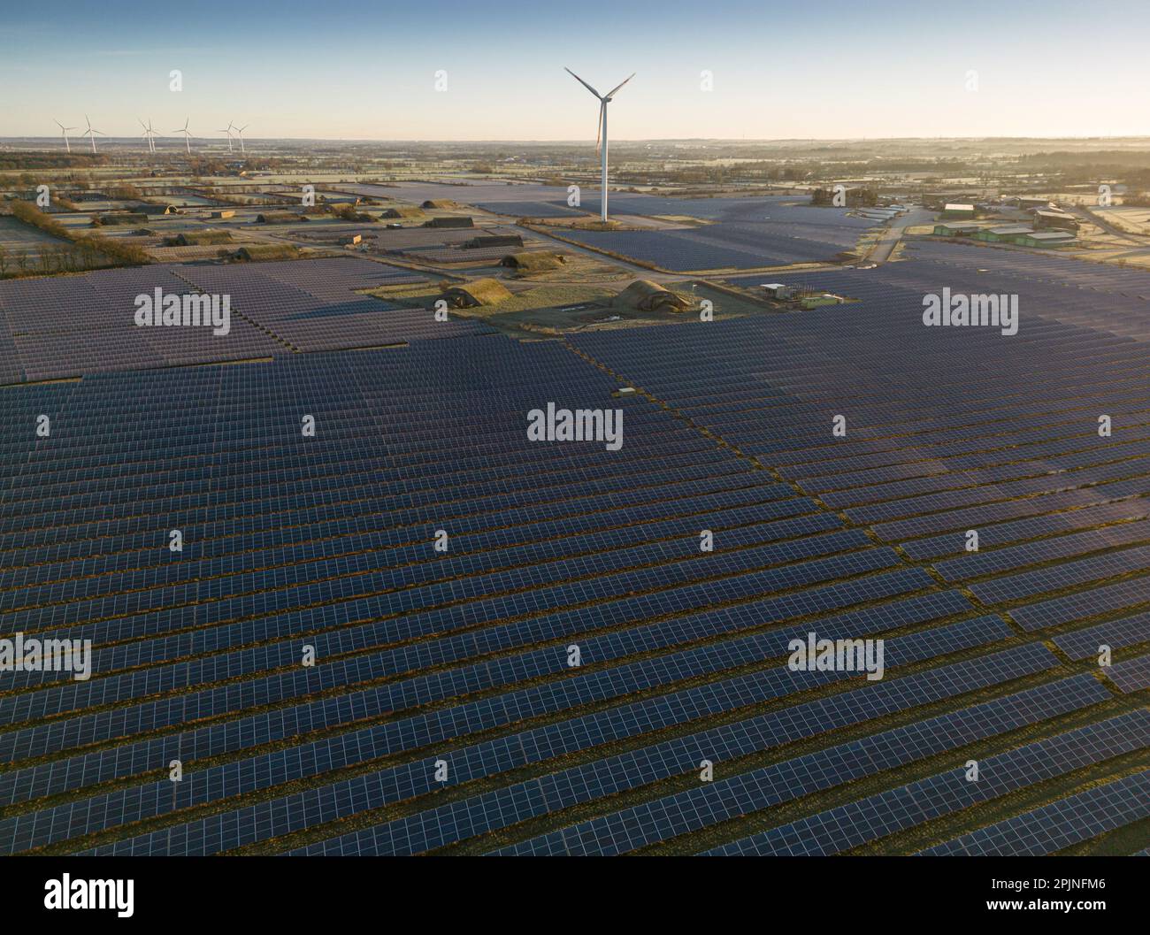Eggebek, Germany. 03rd Apr, 2023. A wind turbine rotates in a solar ...