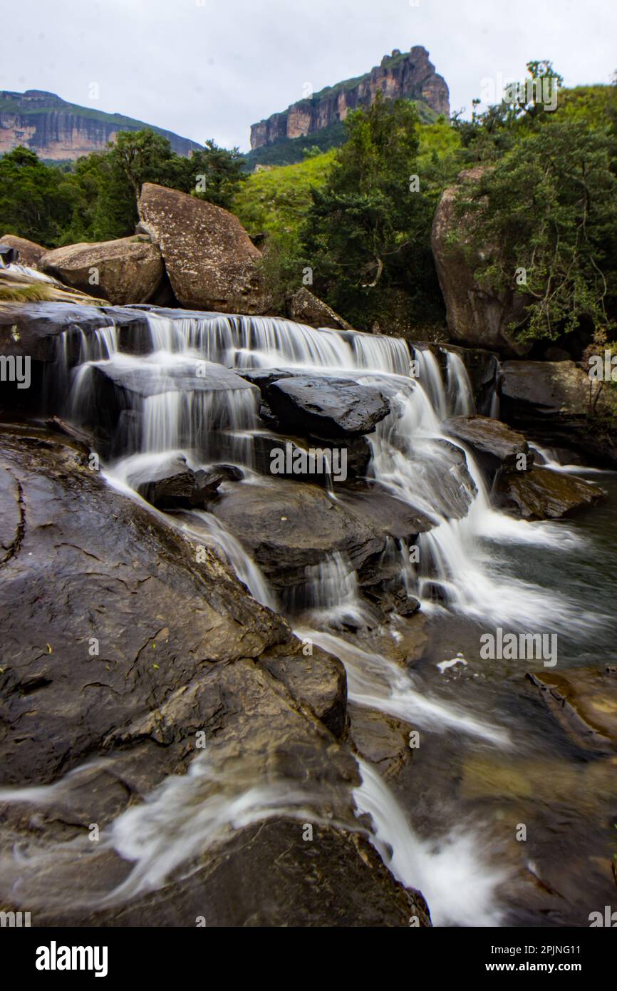 Small Waterfall known as the Mahai cascades, with the Drakensberg ...