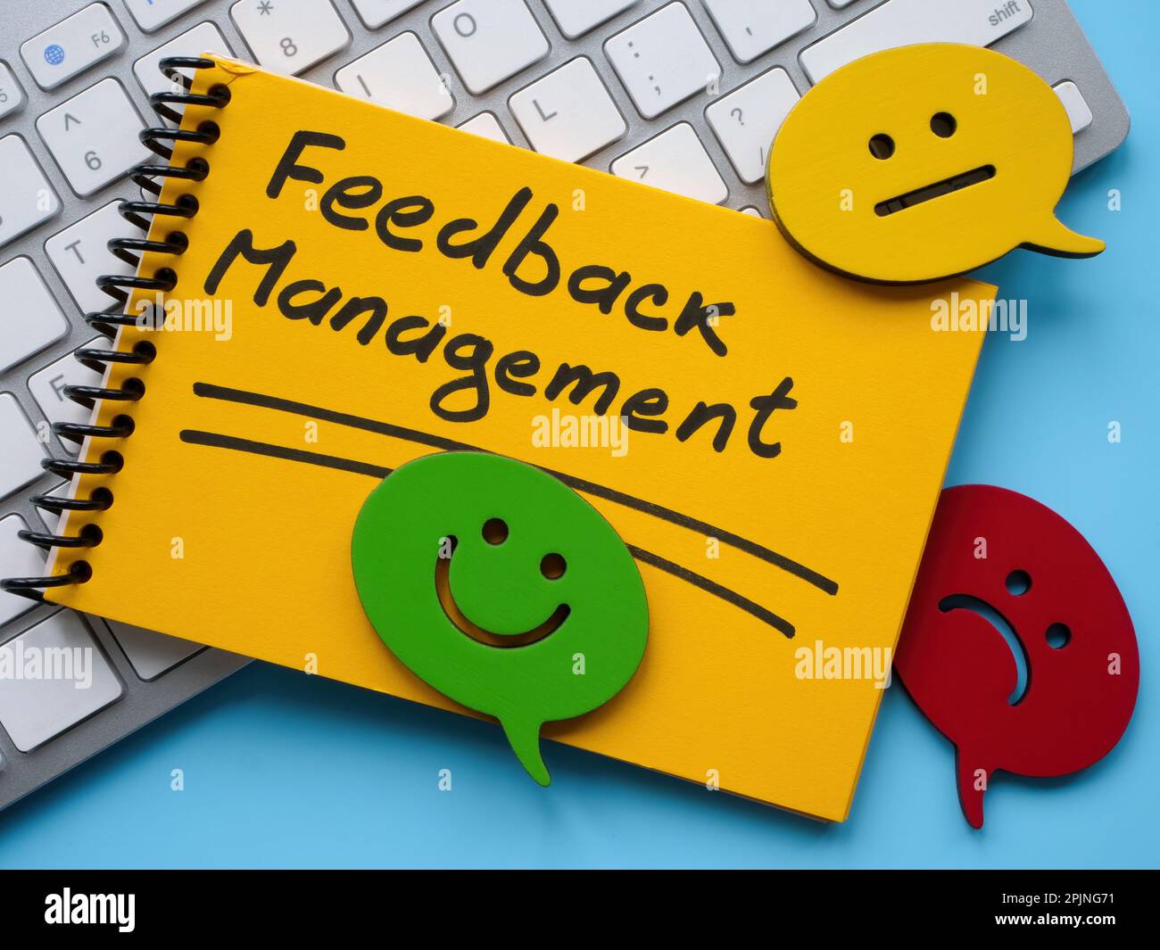 Handwritten Feedback management sign and speech quotes Stock Photo - Alamy
