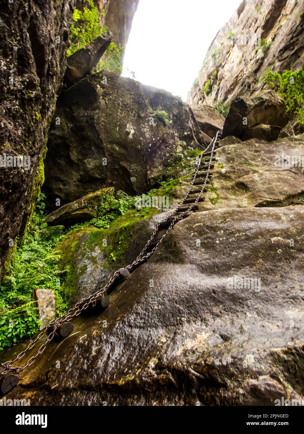 Way up along a precarious chain ladder Stock Photo - Alamy