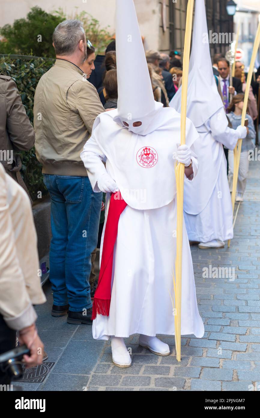 A hooded fraternity member from the Penitencial Cofradia de Nazarenos ...