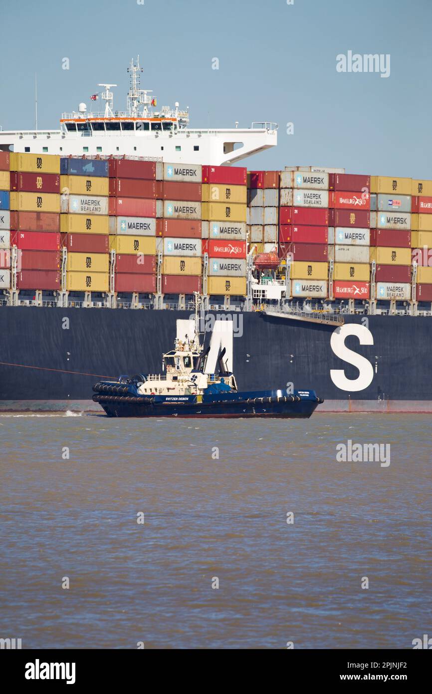 Tugboat Svitzer Deben assisting a container ship at the Port of ...