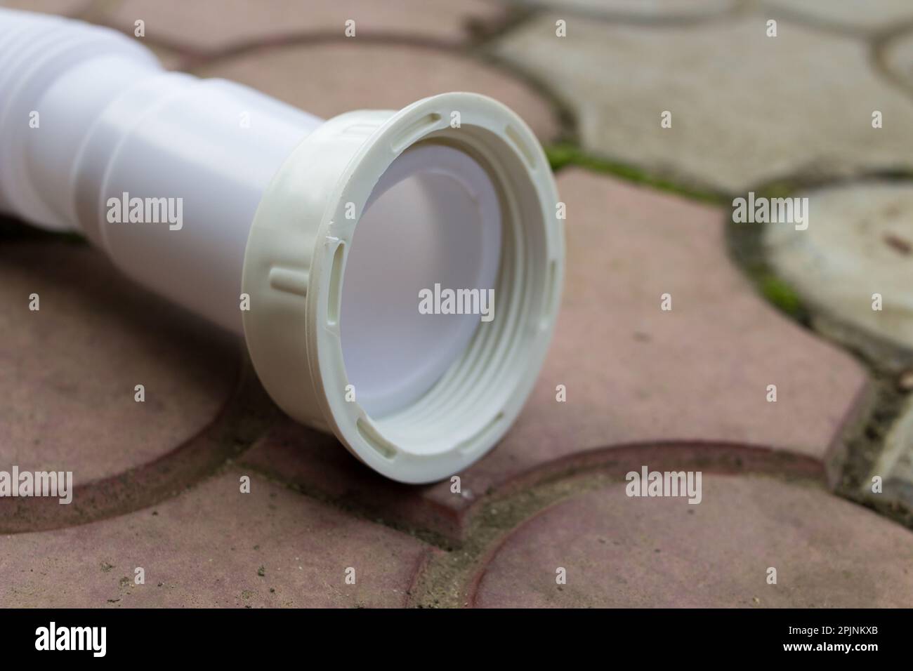 Close-up pipe is a white siphon for sewage Stock Photo - Alamy