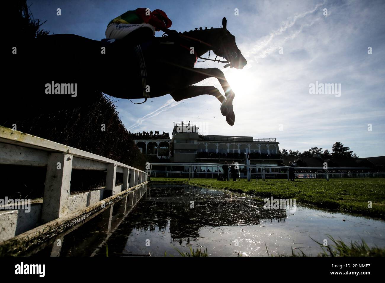A Horse clears the water jump during the Eddie Mapp Memorial Open ...
