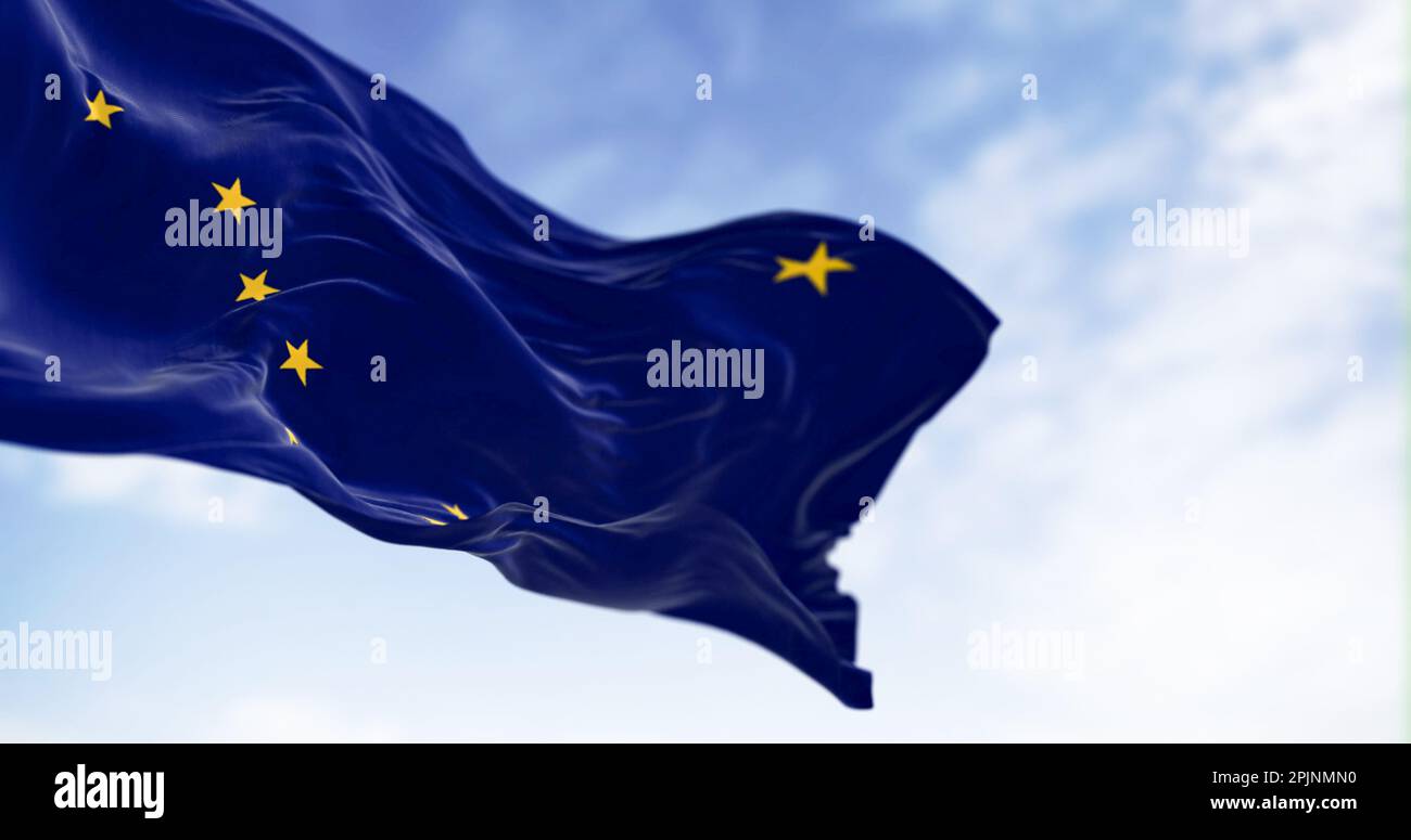 Alaska state flag waving in the wind on a clear day. Big dipper and ...