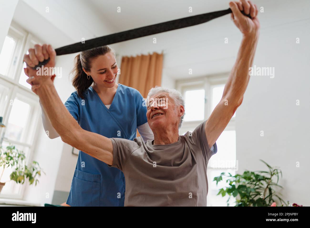 Young nurse doing exercise hi-res stock photography and images - Alamy