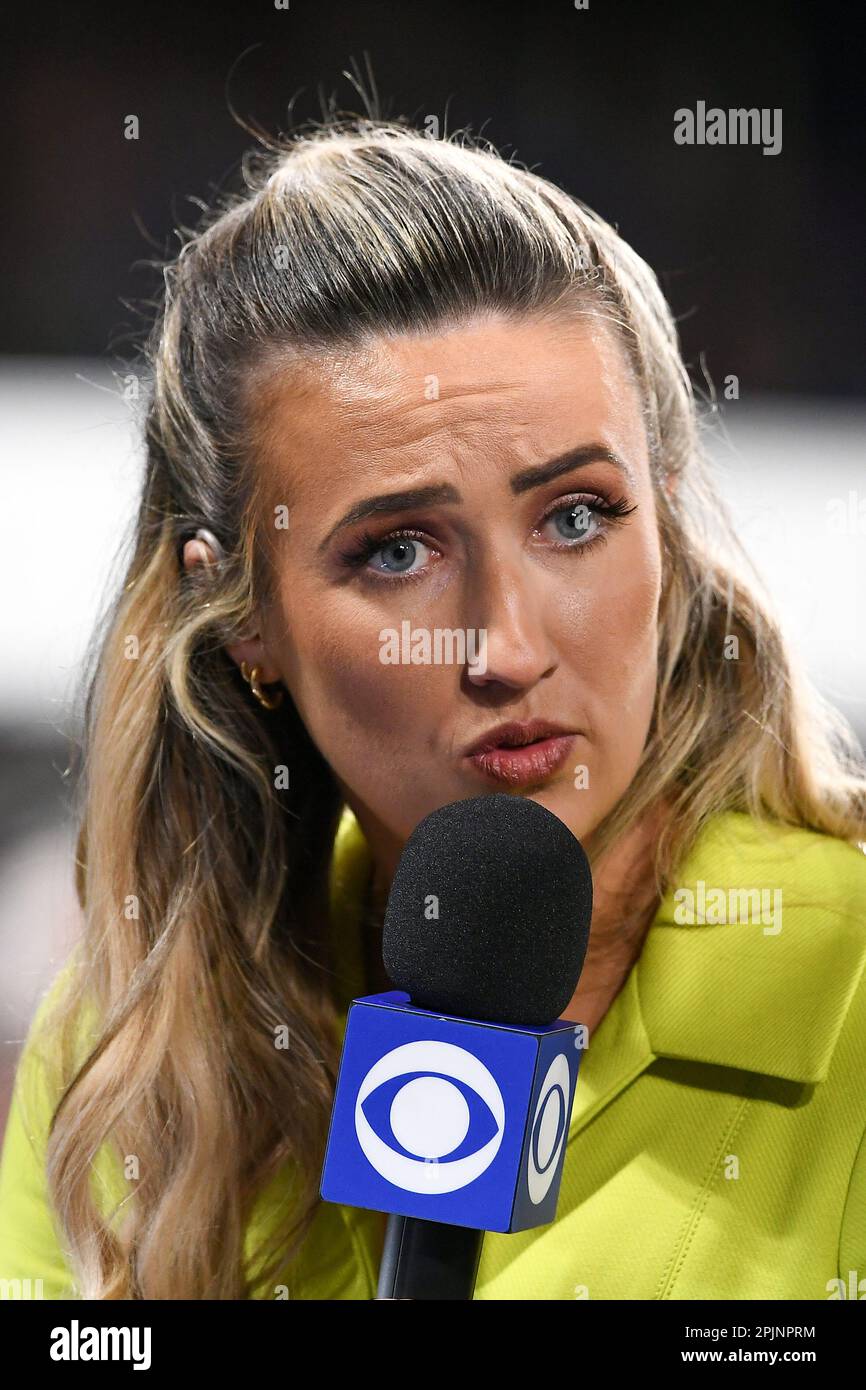 CBS and Paramount television reporter Poppy Miller holds a microphone ...