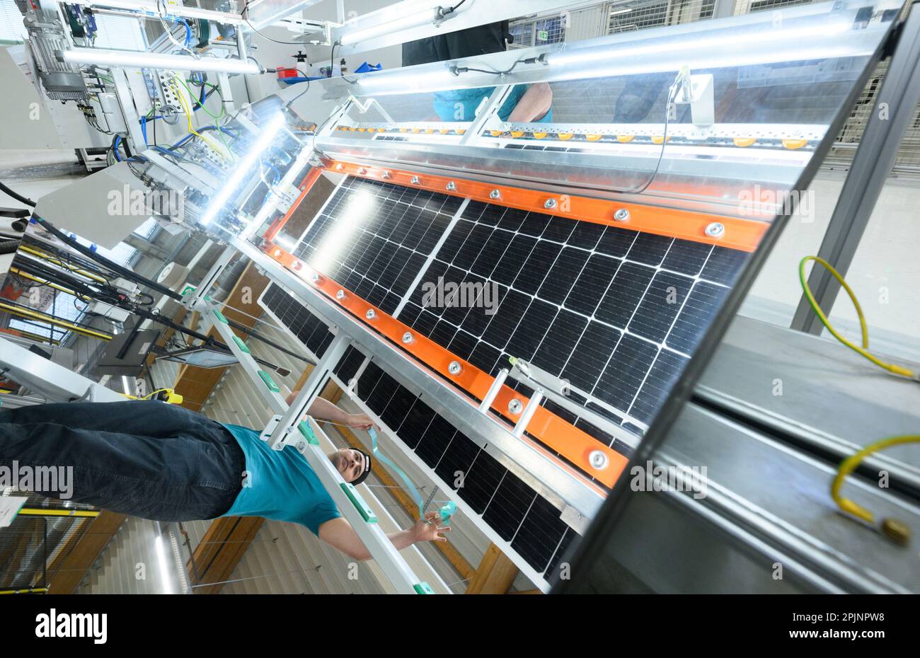 Dresden, Germany. 03rd Apr, 2023. A solar module is inspected from ...
