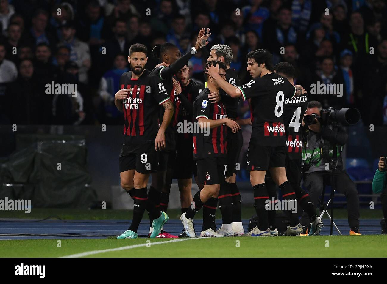 Rafael Leao of AC Milan celebrates with teammates after scoring during ...