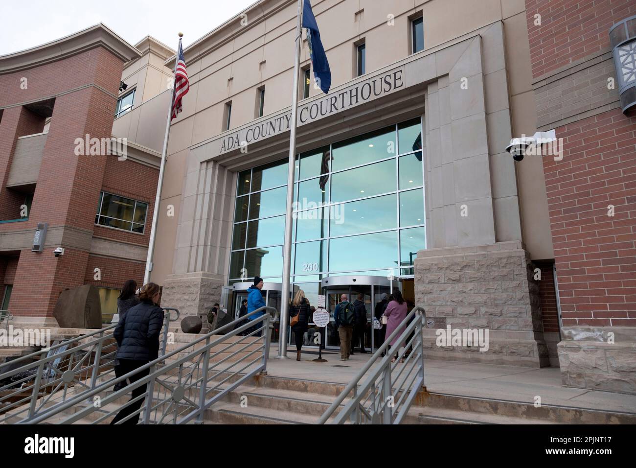 Media gather outside the Ada County courthouse in Boise, Idaho, Monday ...