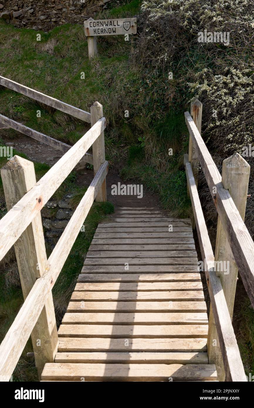 Devon-Cornwall border Marsland Mouth on the South West Coast Path Stock ...