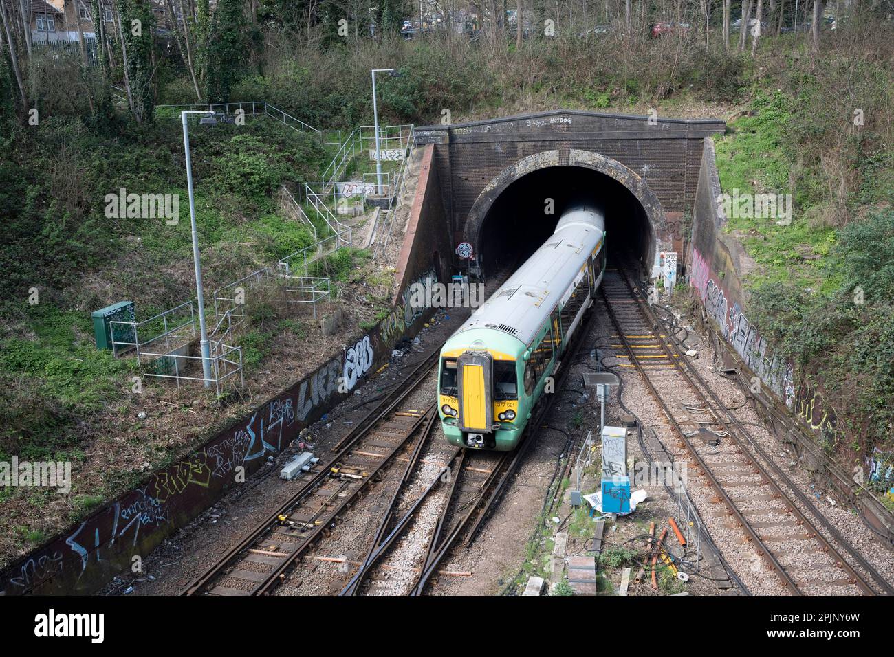 An aerial view of a Southern Railway train exiting the tunnel at ...
