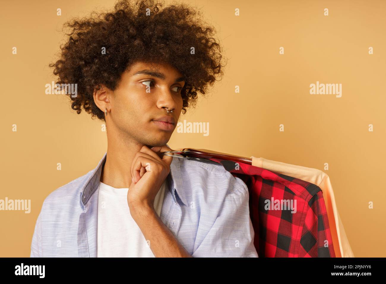 Happy happy man buy clothes on a store Stock Photo - Alamy