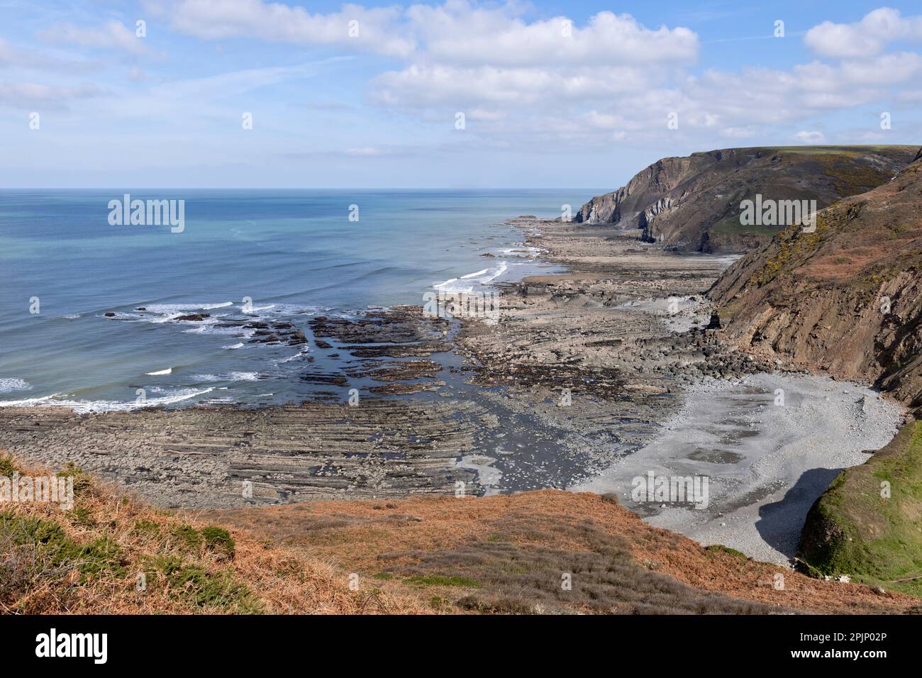 Devon-Cornwall border Marsland Mouth on the South West Coast Path Stock ...