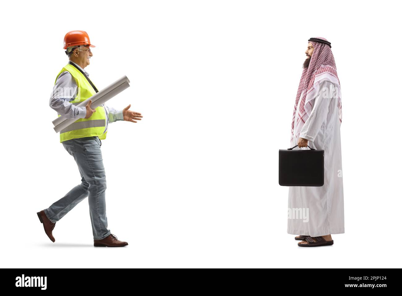 Full length profile shot of a mature male engineer carrying blueprints ...