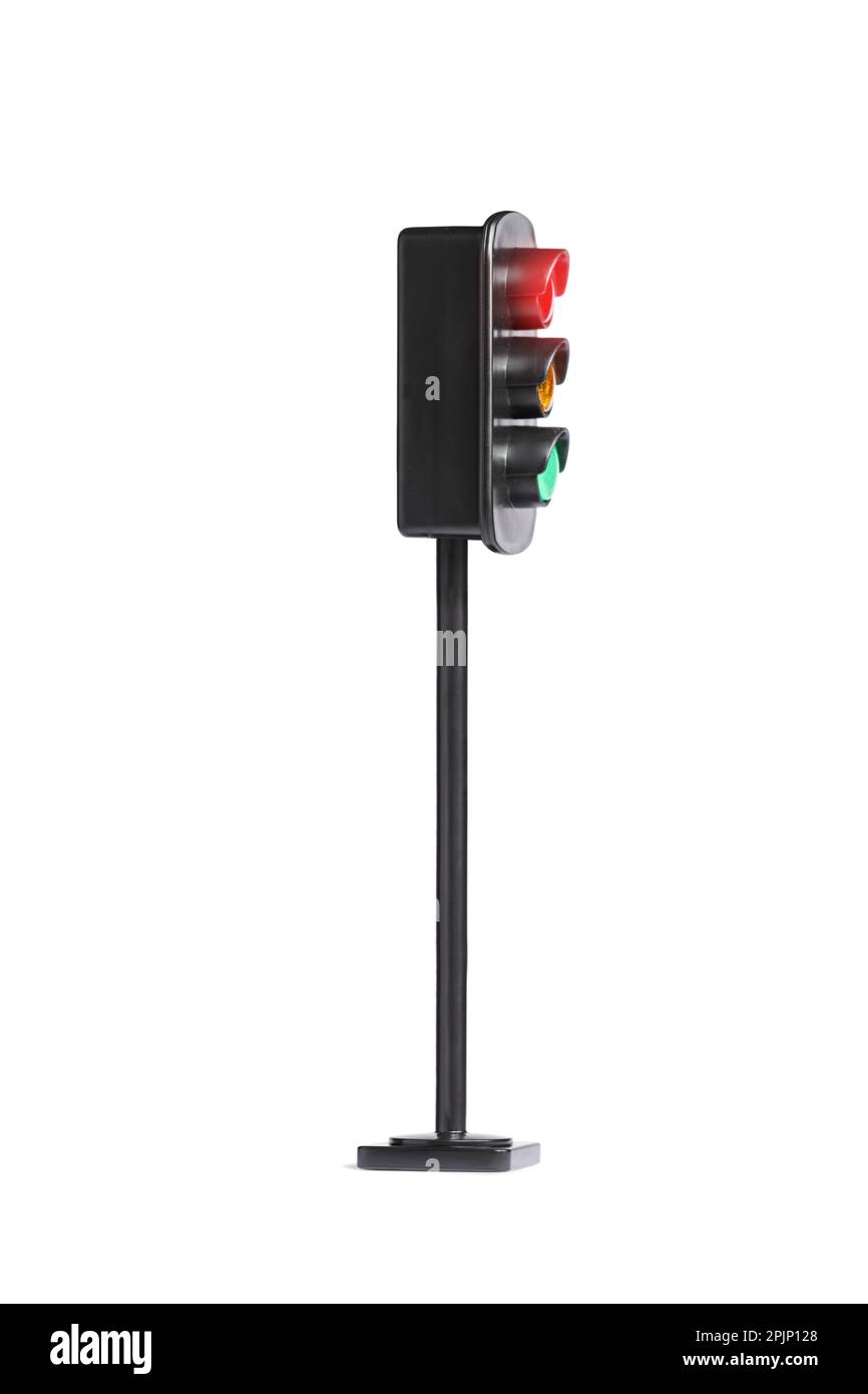 Side shot of a traffic light with red light flashing isolated on white ...
