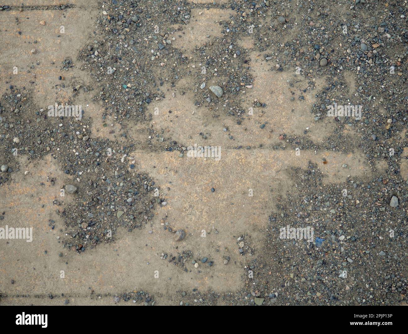 Background of brown tiles and small pebbles. Solid material pattern ...