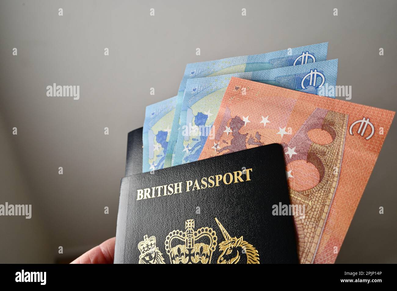 New blue british passport hi-res stock photography and images - Alamy