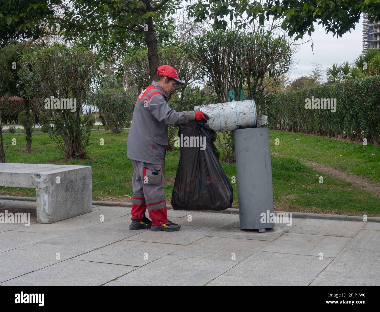 Batumi, Georgia. 03.11.2023 modern janitor does his job. Street ...