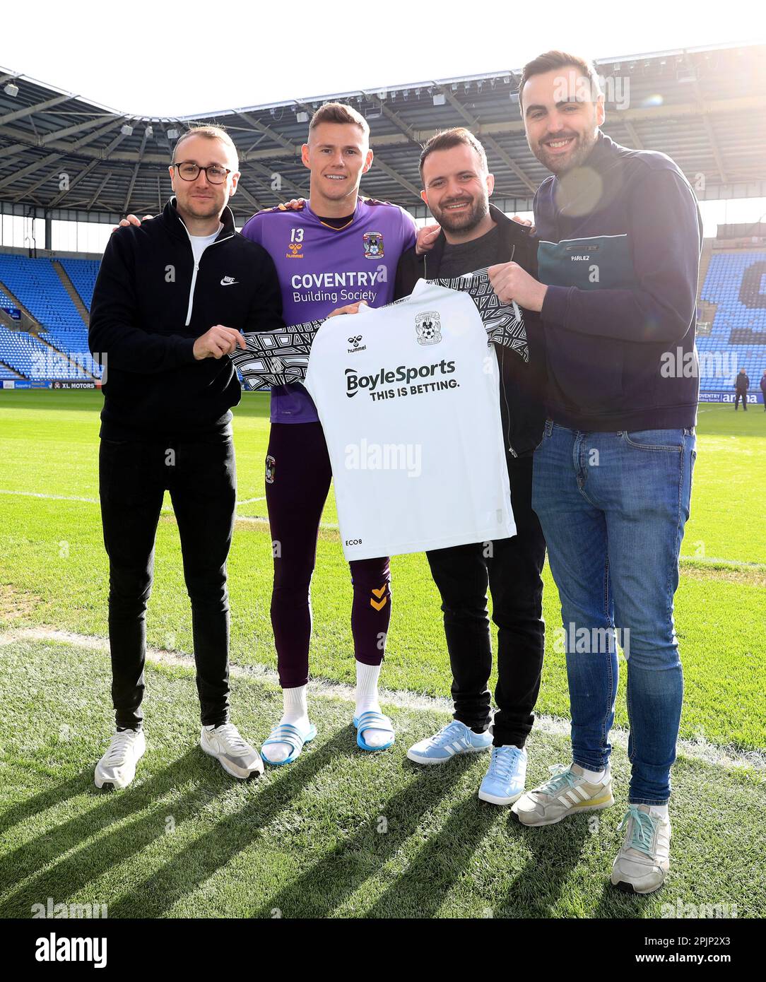 Coventry City goalkeeper Ben Wilson with sponsors at Coventry Building ...