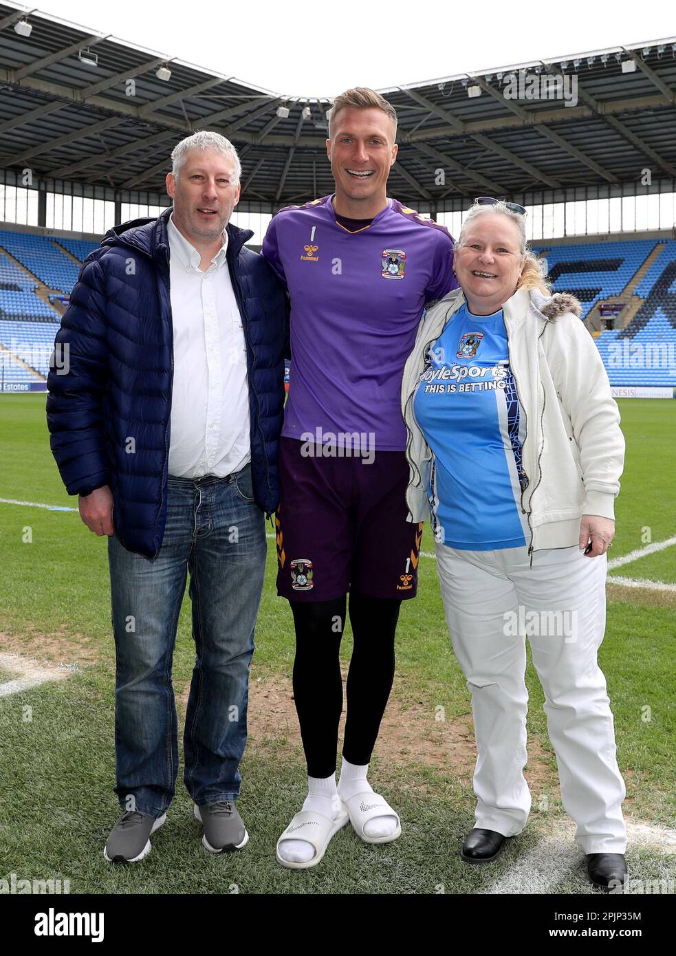 Coventry City goalkeeper Simon Moore with sponsors at Coventry Building ...