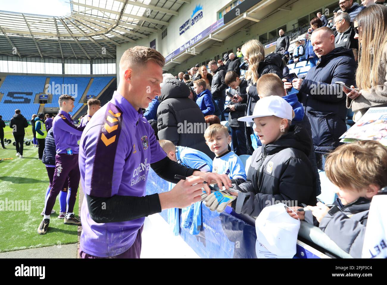 Coventry City goalkeeper Simon Moore signs for fans after training at ...