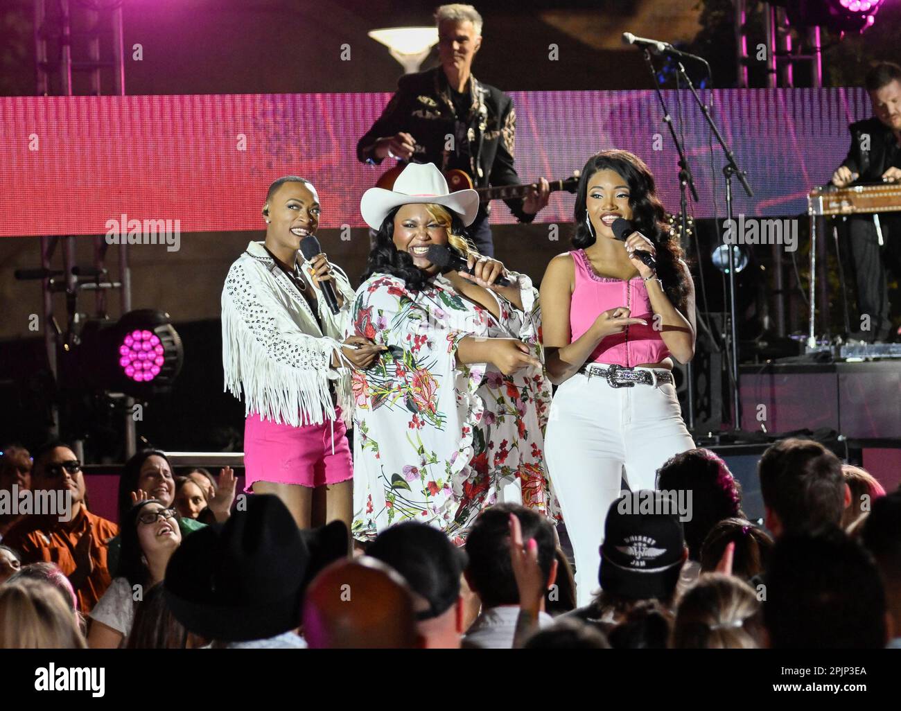 Trea Swindle, left, Danica Hart and Devynn Hart of Chapel Hart perform ...