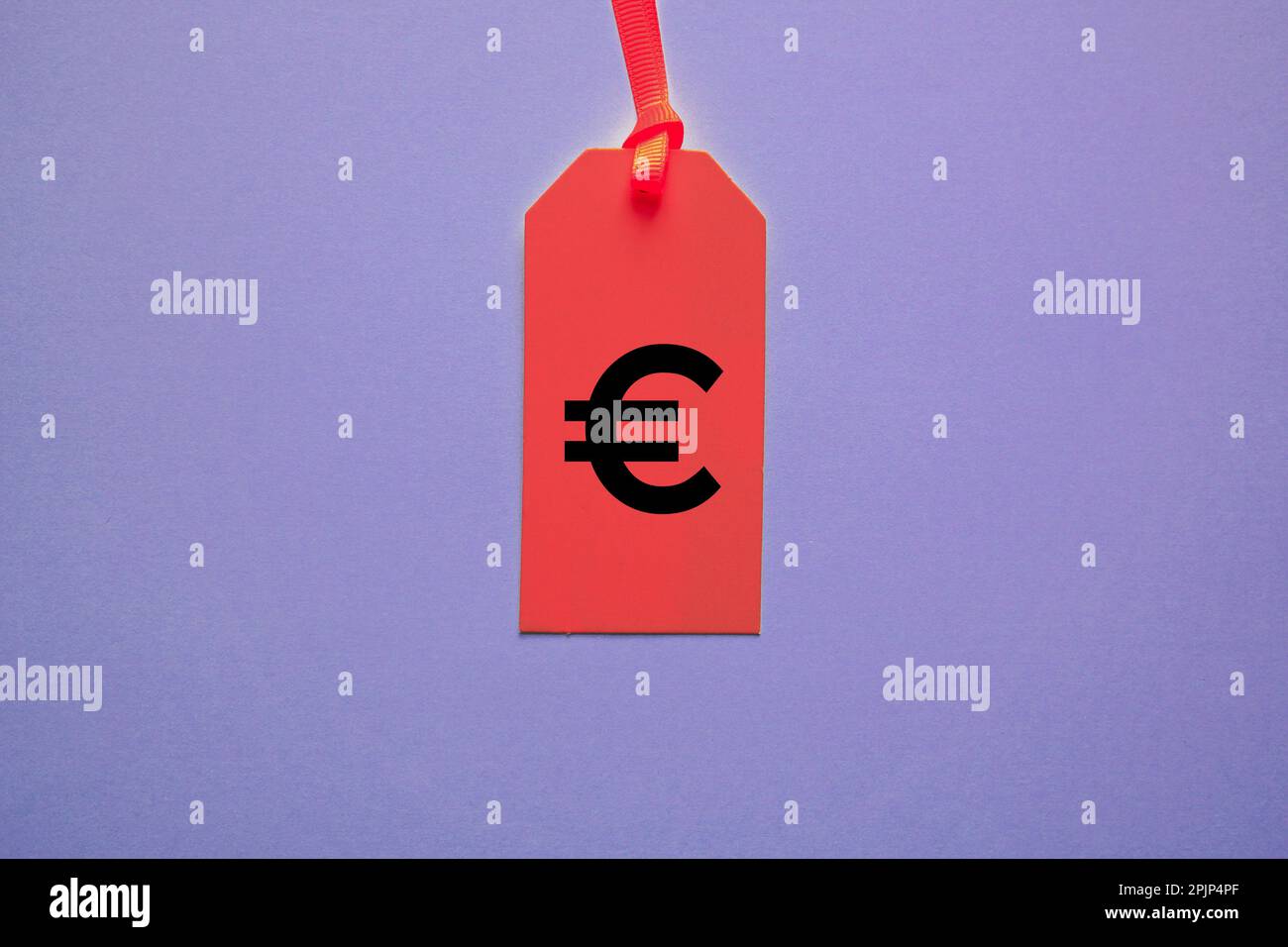 euro sign on the red price tag for sales Stock Photo - Alamy