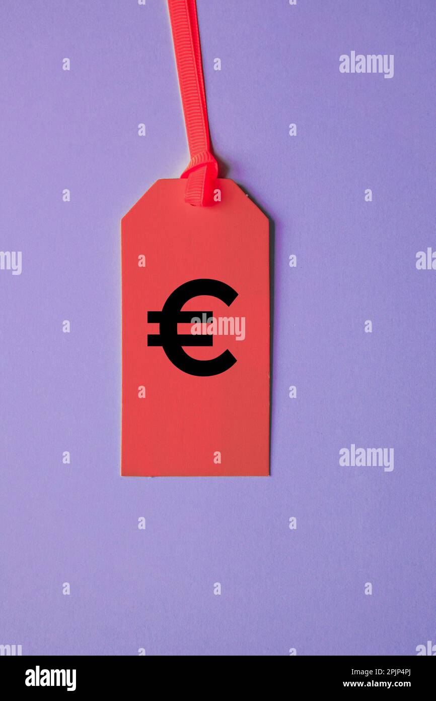 euro sign on the red price tag for sales Stock Photo - Alamy