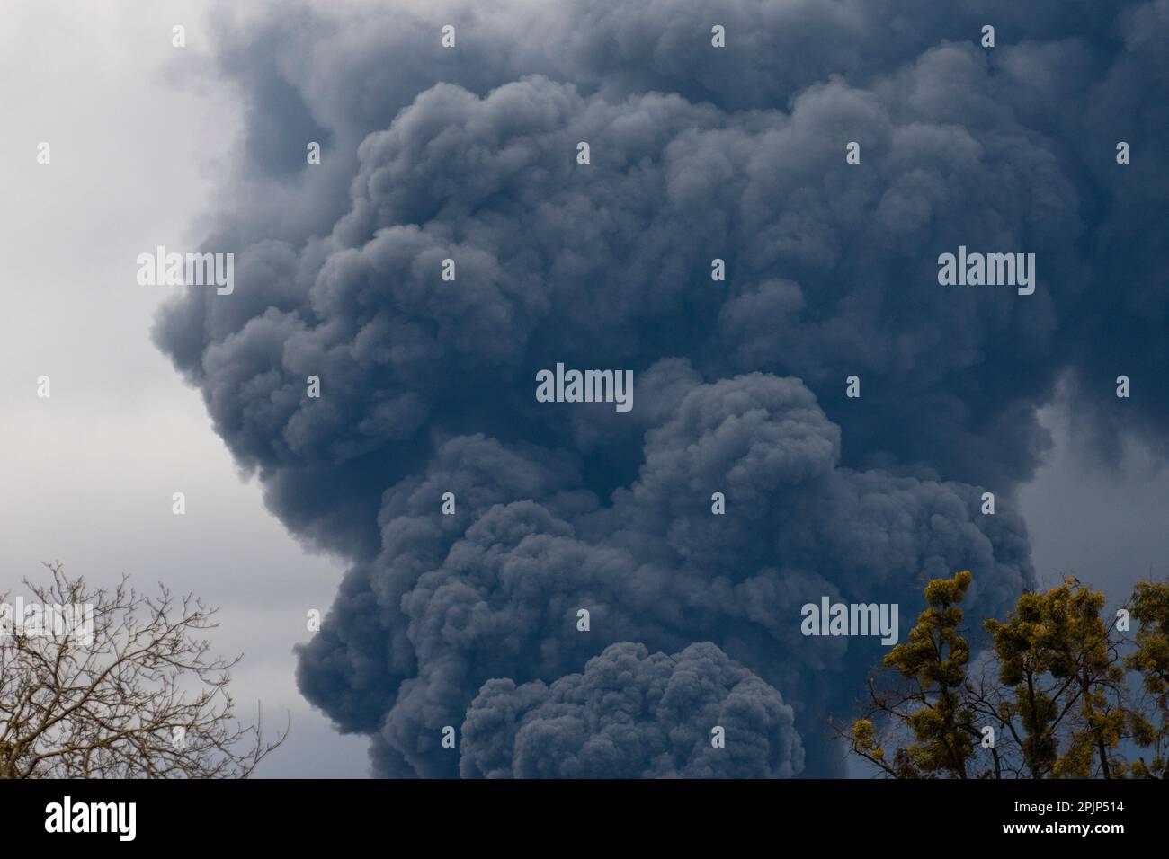 Thick black smoke covers the sky during the war between Ukraine and ...